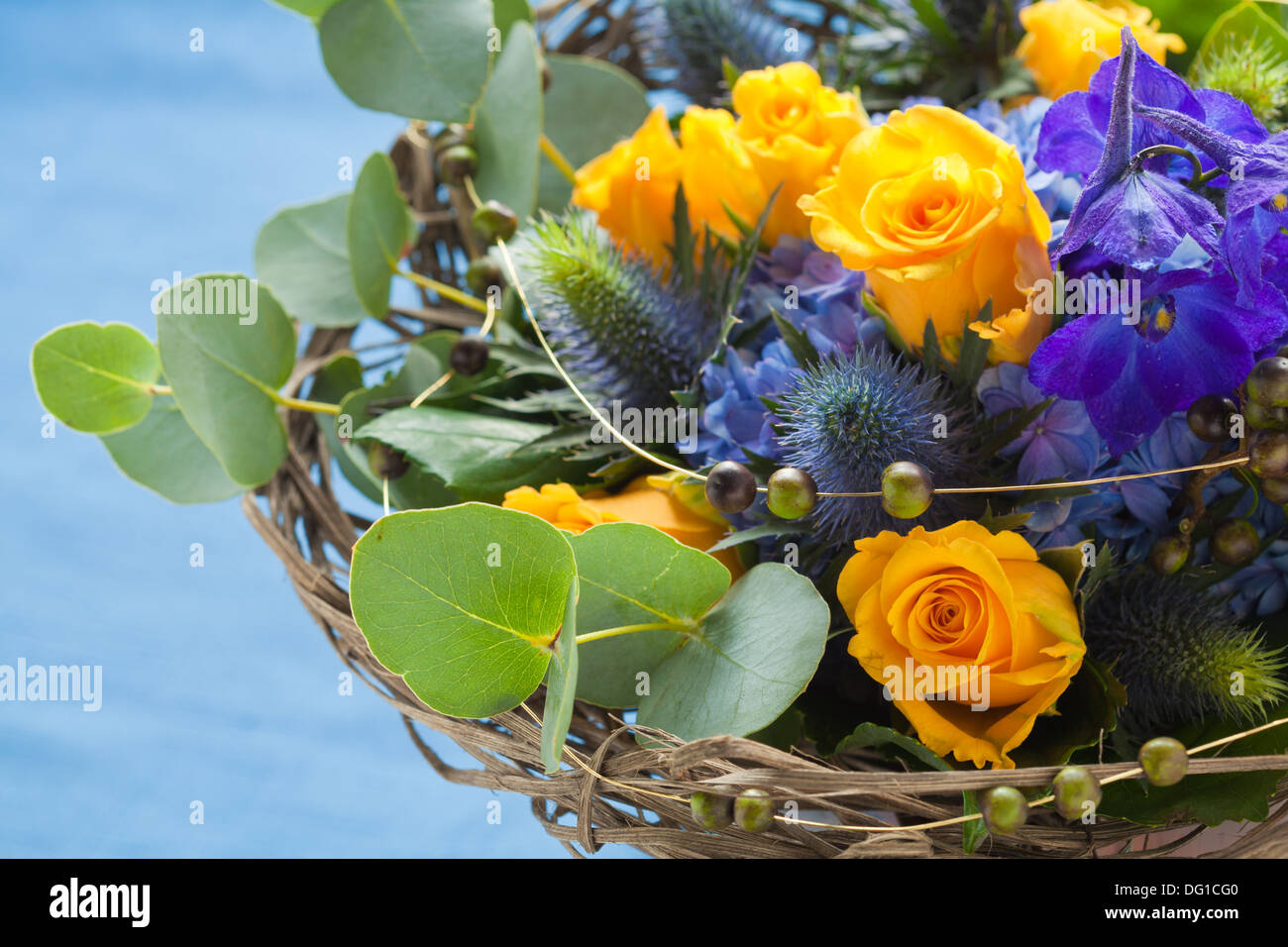 beautiful blue and yellow bouquet with roses Stock Photo - Alamy