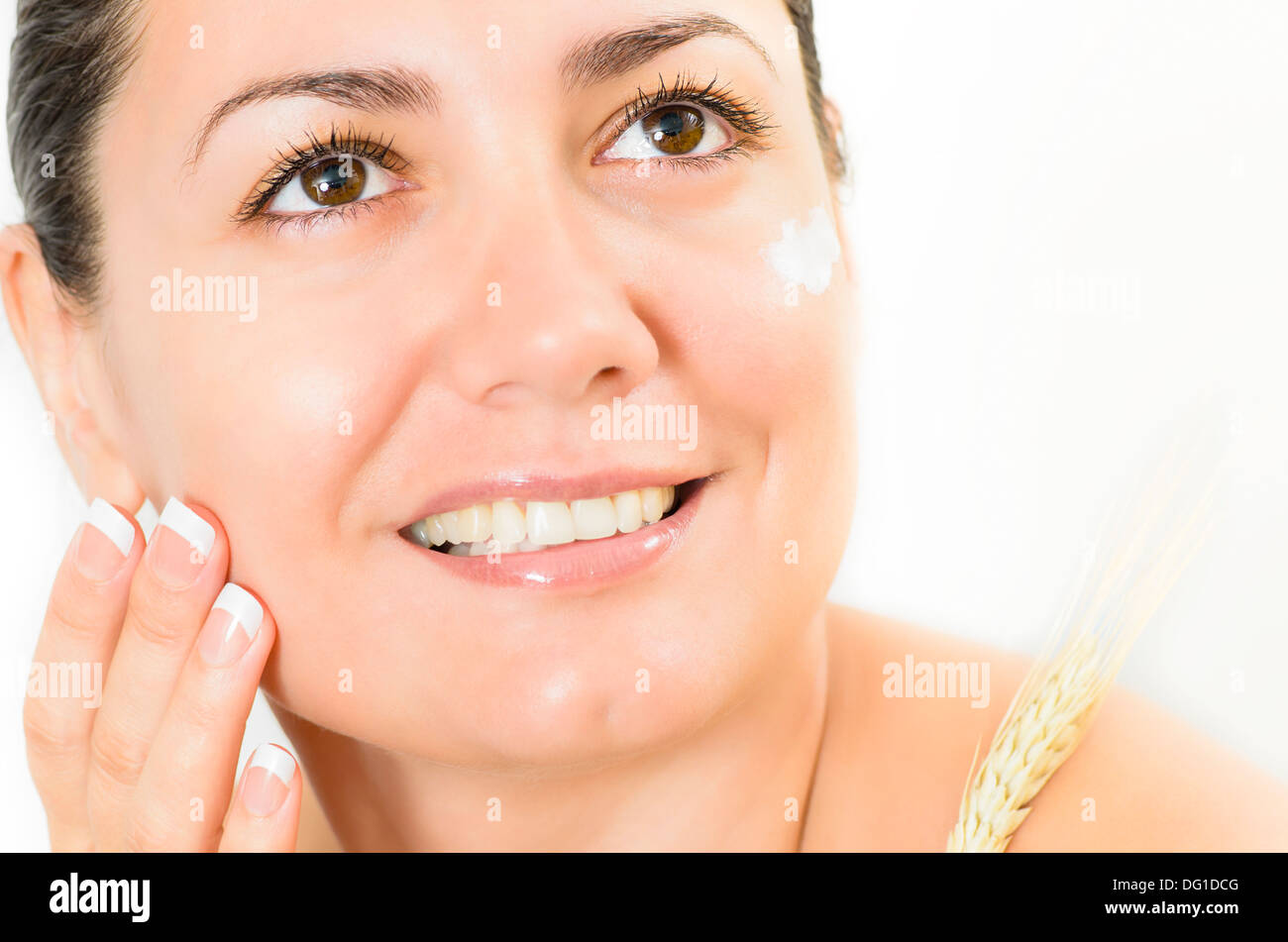 Woman cream portrait moisturizing hi-res stock photography and images ...