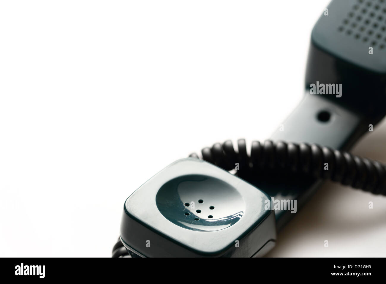 Old-fashioned green telephone receiver Stock Photo - Alamy