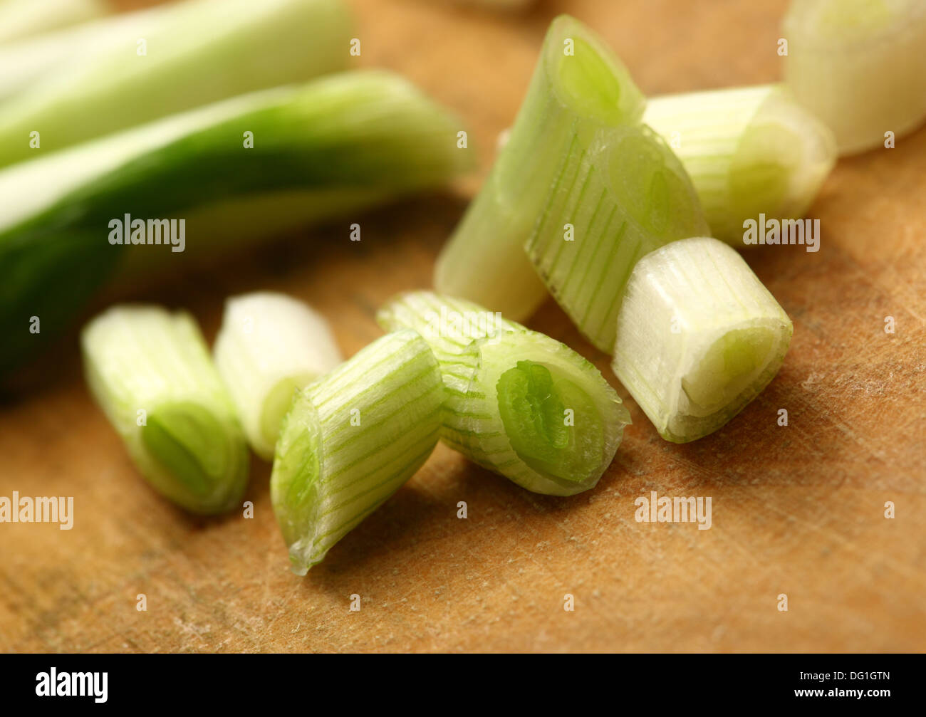 Chopped spring onions on preparation table Stock Photo - Alamy