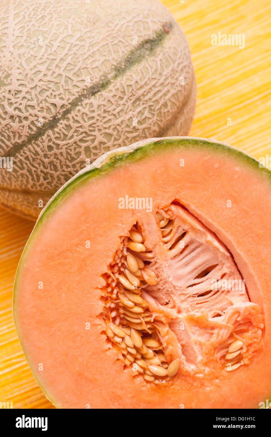 Sliced orange charentais melon with pips Stock Photo - Alamy