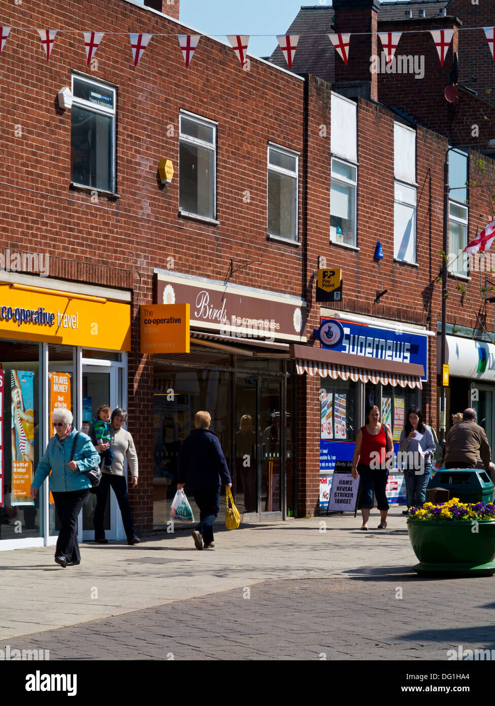 Shoppers in a pedestrianised high street in Belper Derbyshire England ...