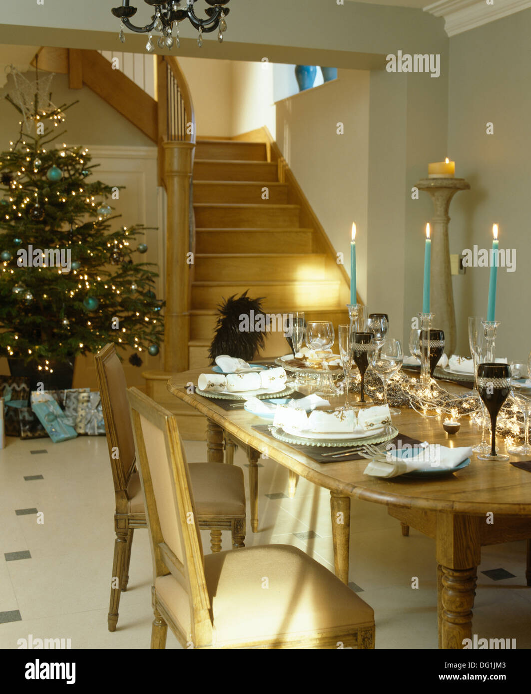 Table set for Christmas lunch in contemporary hall dining room with ...