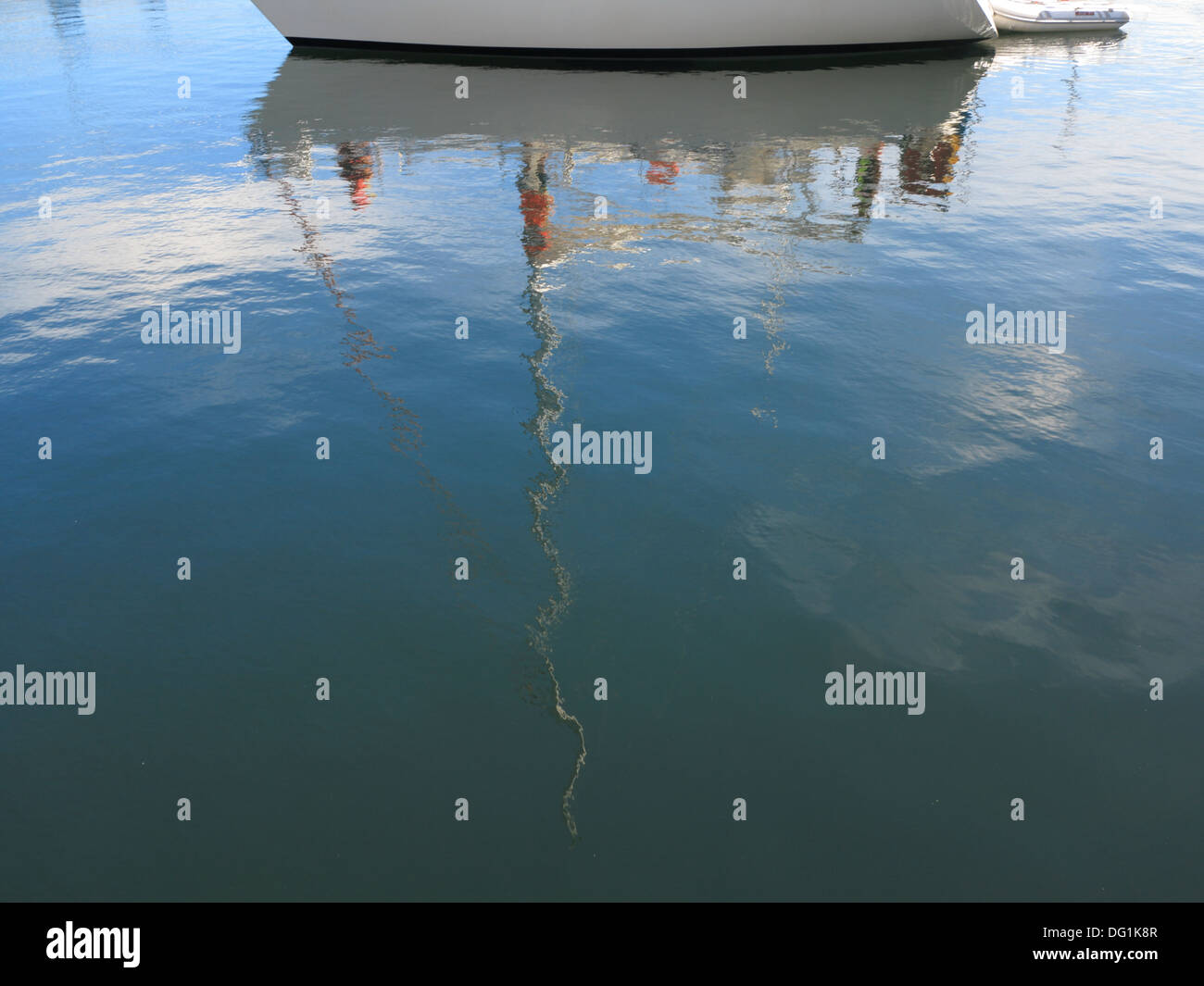 Ship detail in blue sea water with reflection. Yacht detail. Yachting ...