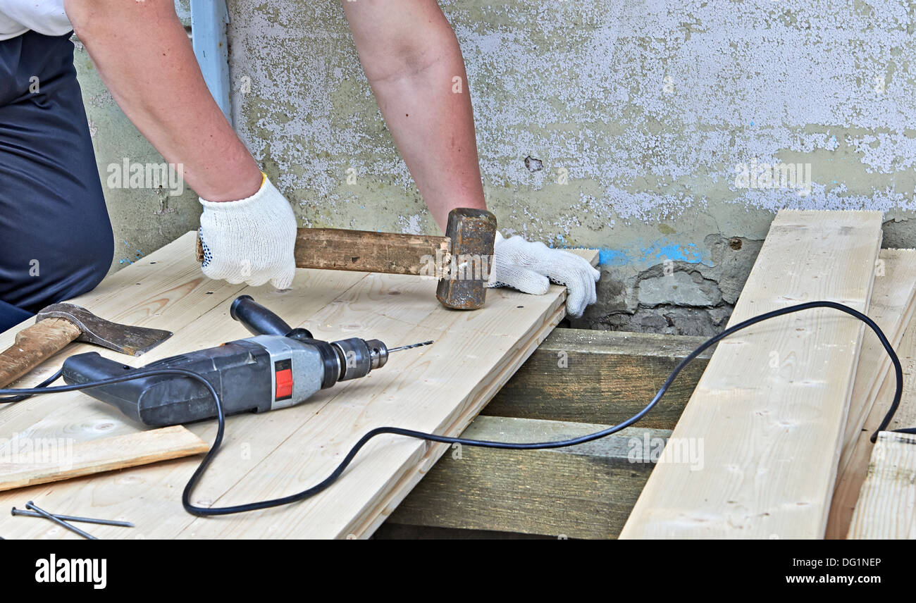 DIY Tools. Work on plank wood floor Stock Photo - Alamy
