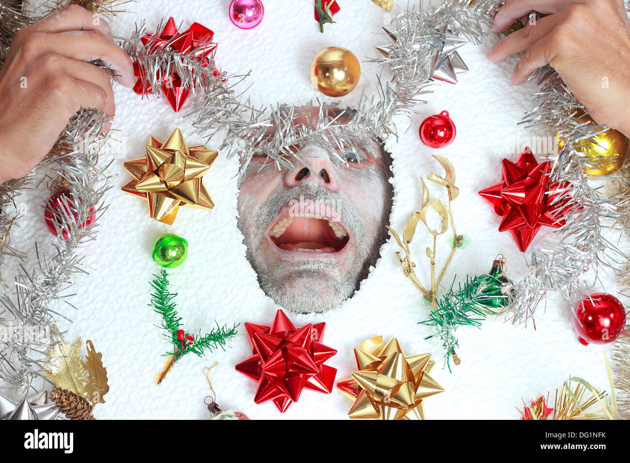 Man under christmas decoration hi-res stock photography and images - Alamy