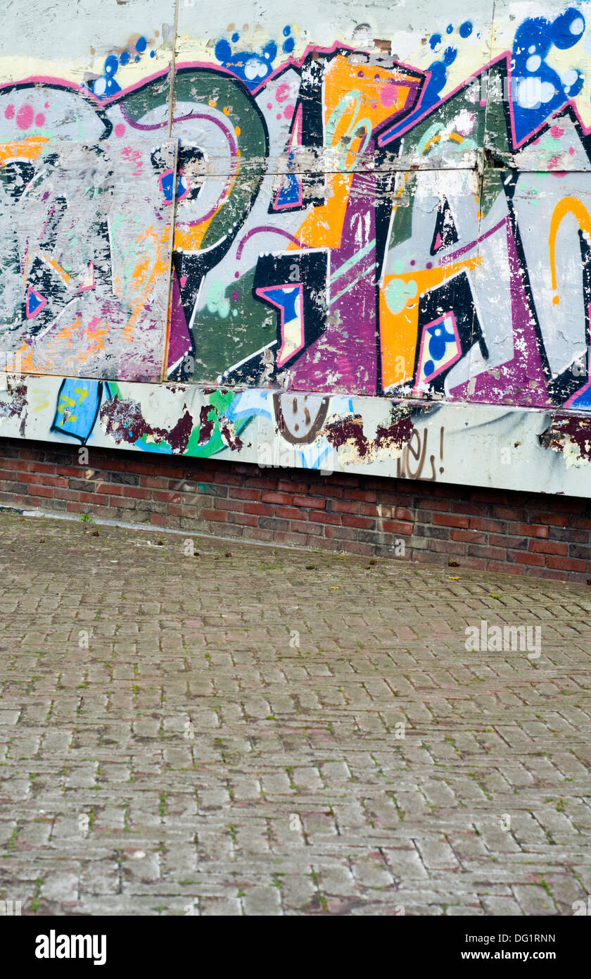 Detail of graffiti on a city center wall Stock Photo - Alamy