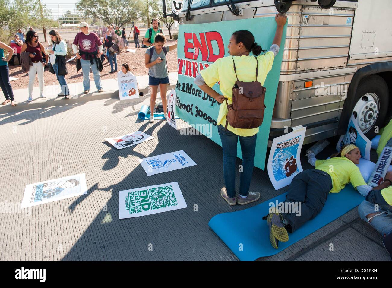 Tucson, Arizona, UK. 11th Oct, 2013. Approximately 20 protestors ...