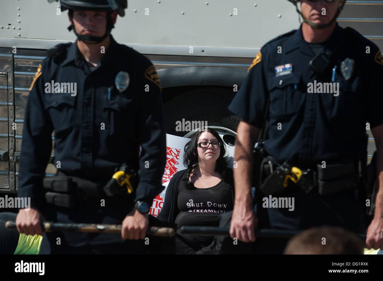 Tucson, Arizona, UK. 11th Oct, 2013. Approximately 20 protestors ...