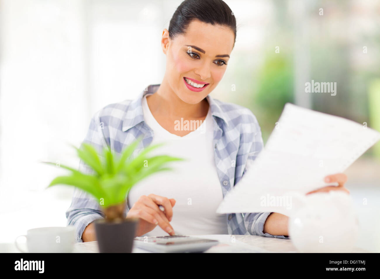 Woman bills home hi-res stock photography and images - Alamy