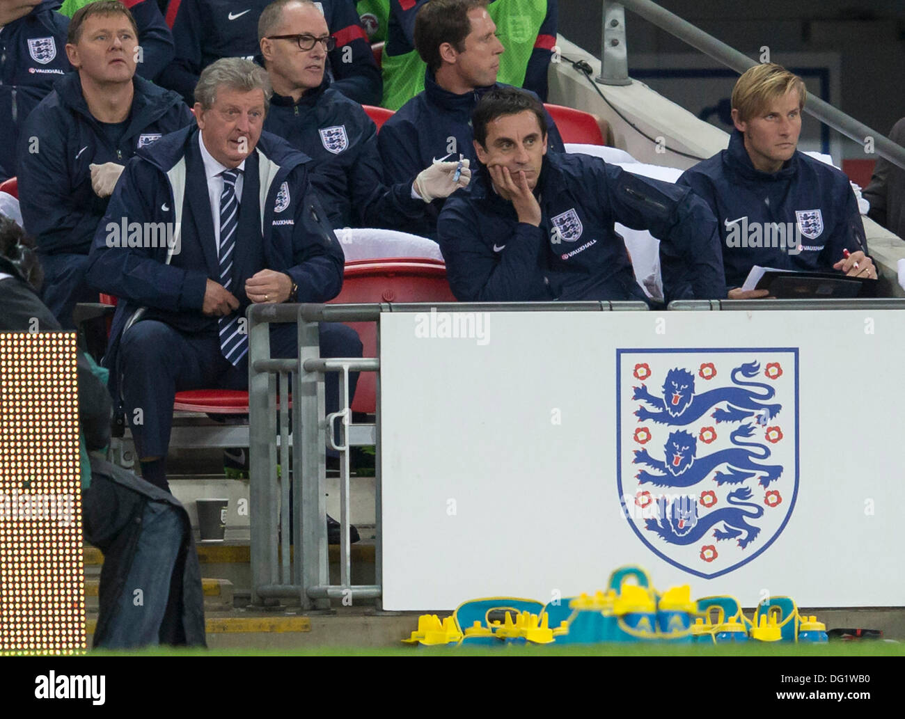 London, UK. 11th Oct, 2013. The England management team look on during ...