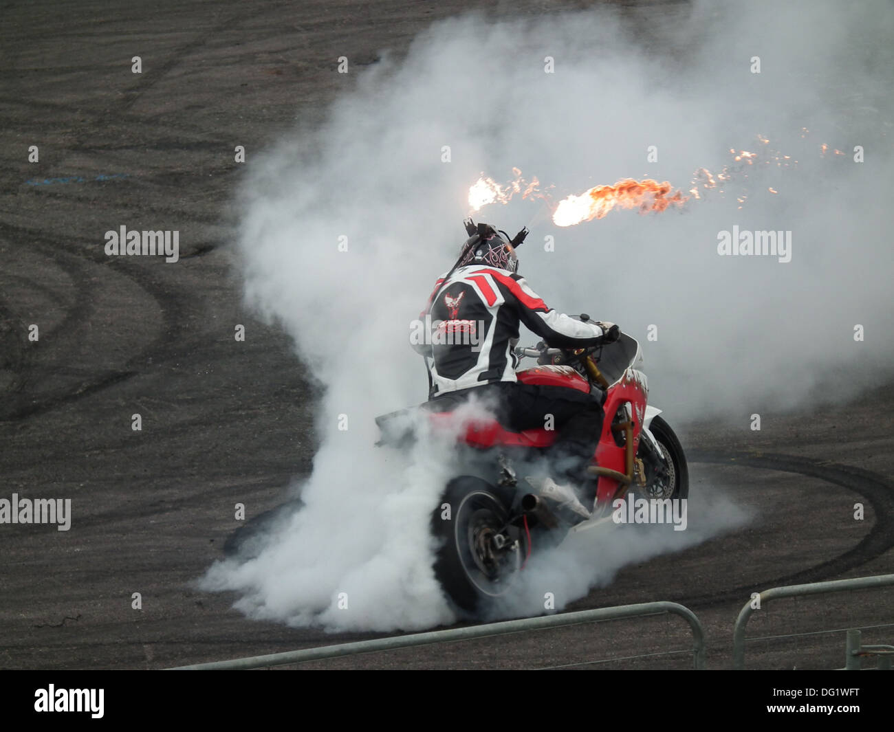 Motorbike stunt rider Stock Photo - Alamy