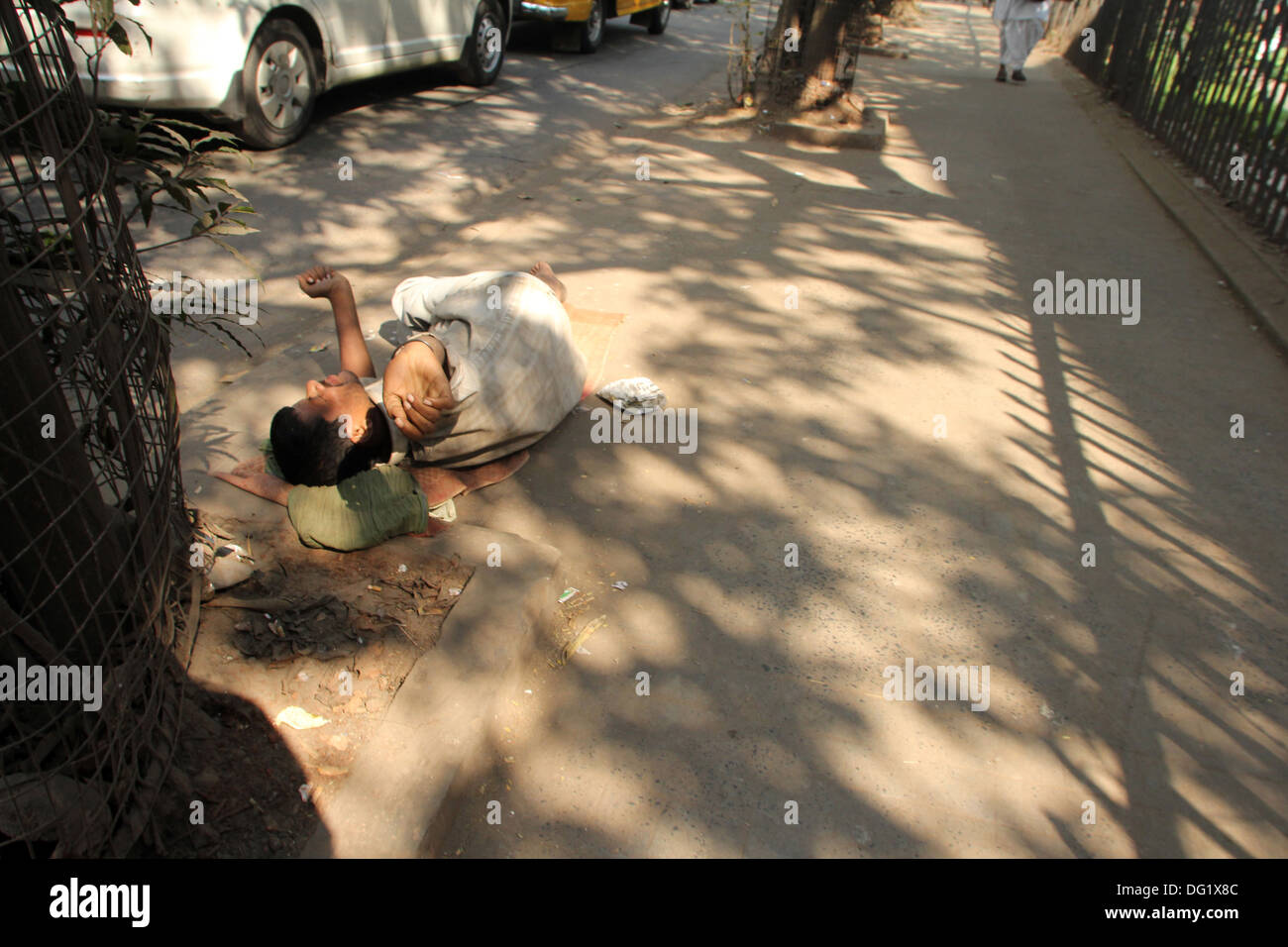 Homeless people sleeping on the footpath of Kolkata. on November 28 ...