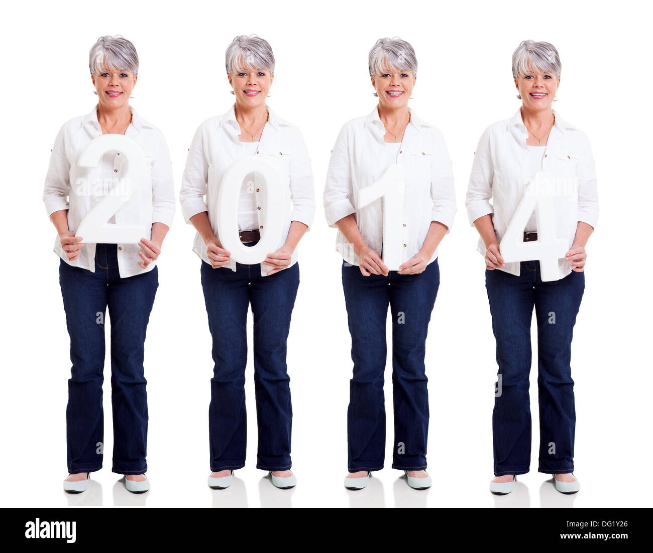 mature woman holding numbers of new year 2014 Stock Photo - Alamy