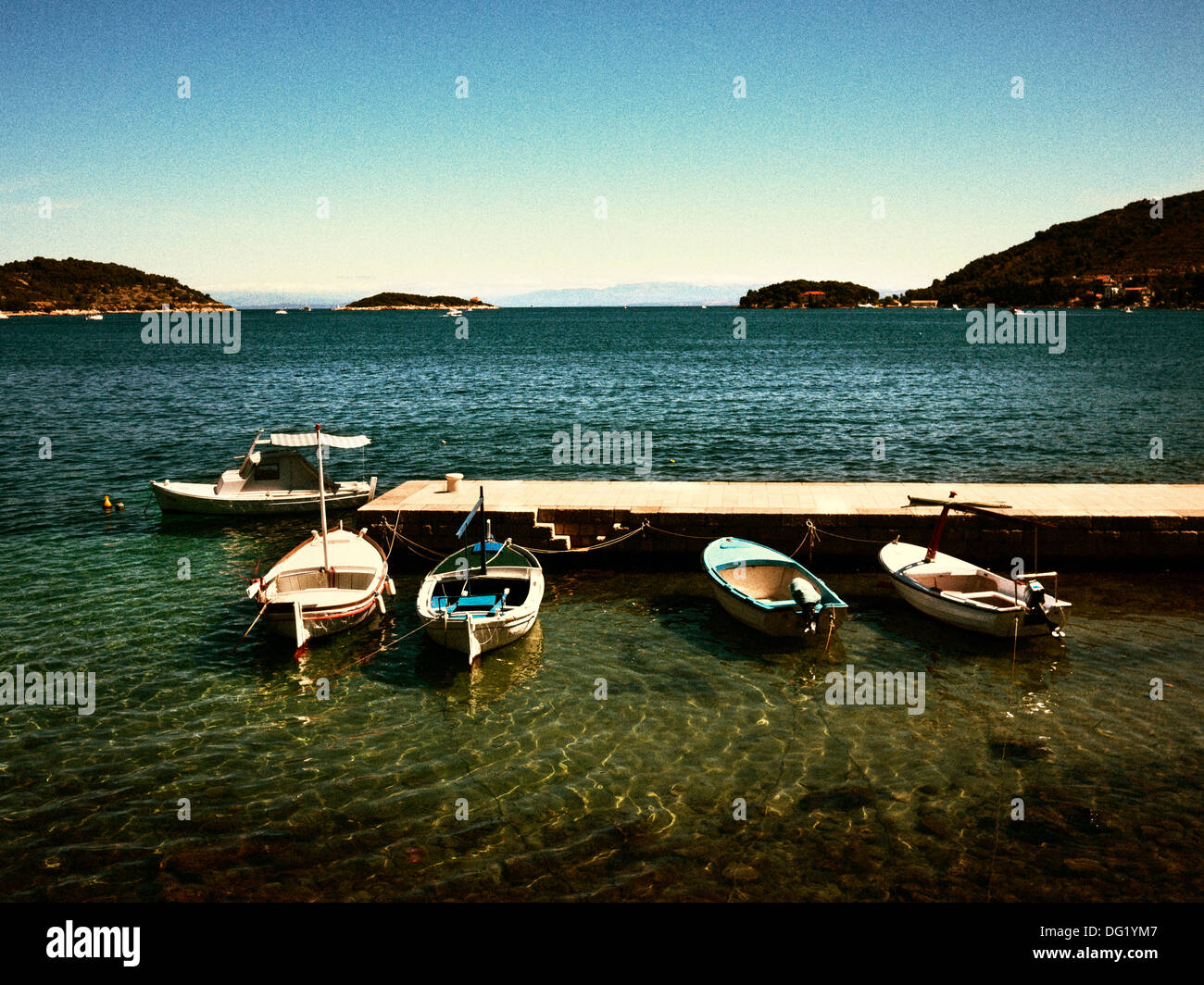 Green pier for small boats hi-res stock photography and images - Alamy