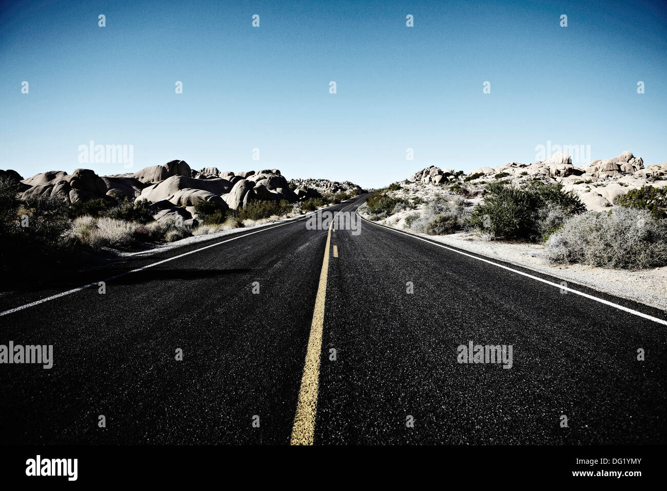 Remote Road Lined with Rock Outcroppings, Joshua Tree National Park ...