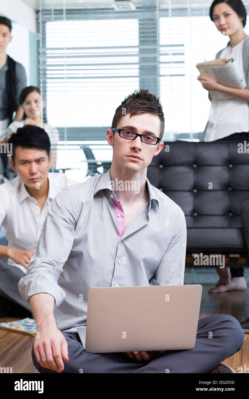 Serious office workers in the company Stock Photo - Alamy