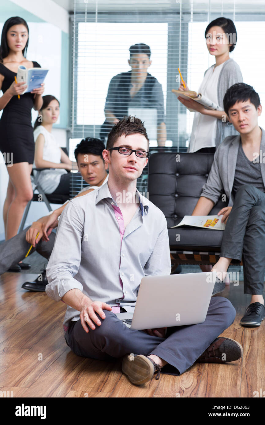 Serious office workers in the company Stock Photo - Alamy