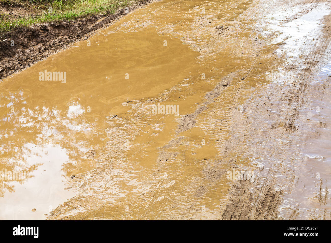 mud and puddle in rut of dirt ground road in caucasus mountain Stock ...