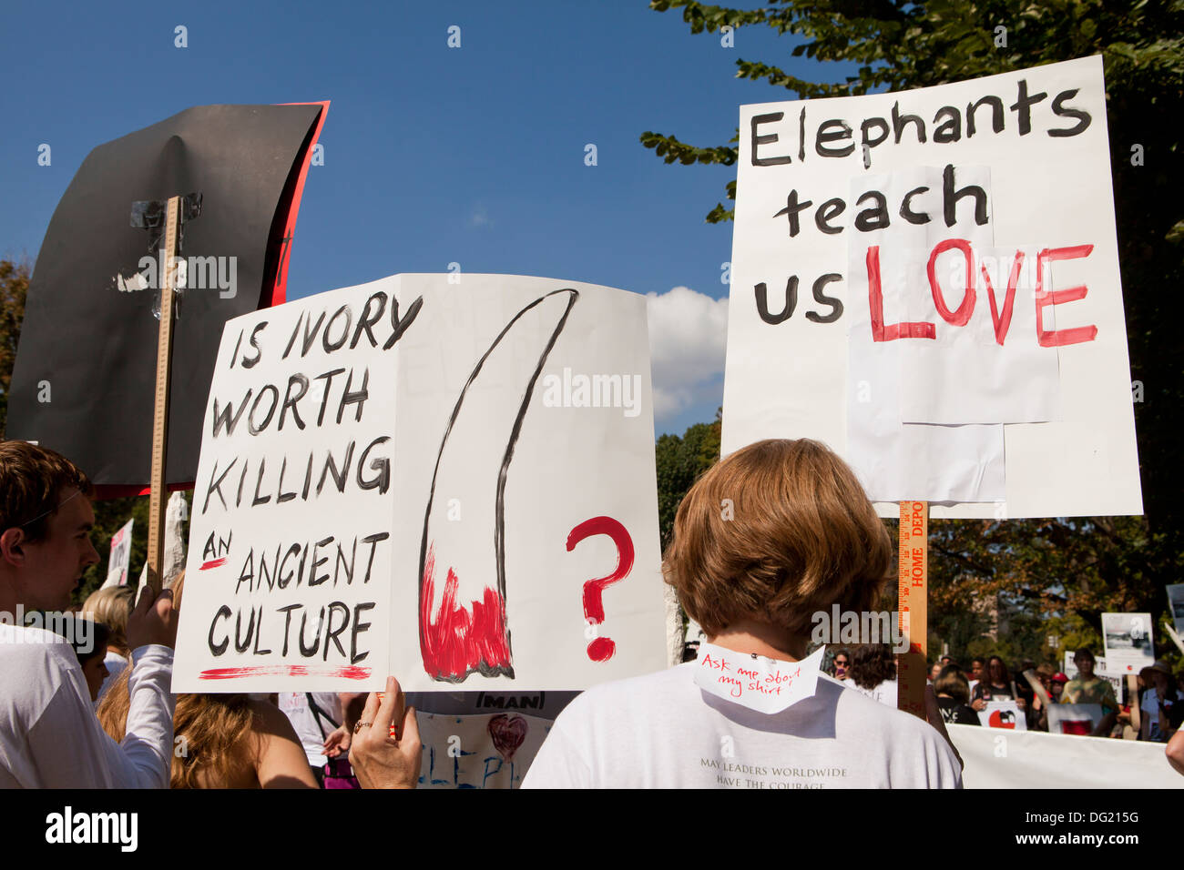 Elephant March demonstrators holding up signs protesting against ...