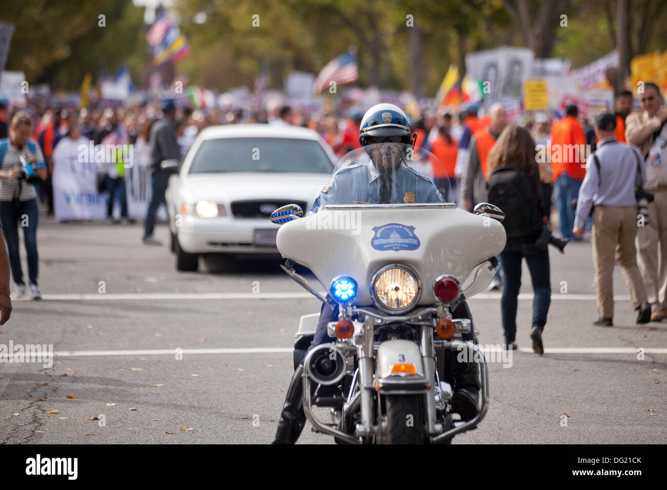 Motorcycle policeman leading a rally demonstration - Washington, DC USA ...