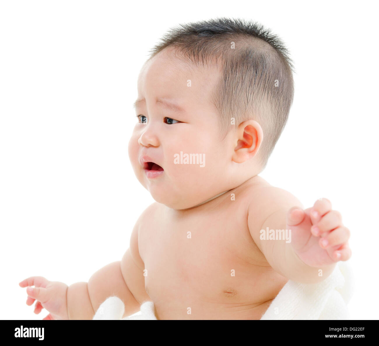 Hungry Asian baby boy crying, sitting isolated on white background ...