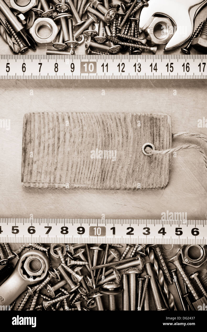 metal construction hardware tool on metal texture Stock Photo - Alamy