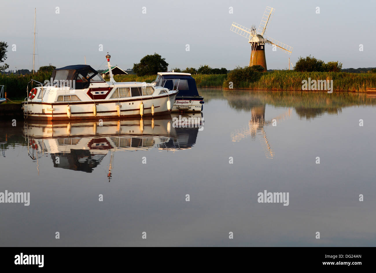 An early morning view on the Norfolk Broads at the entrance to Thurne ...
