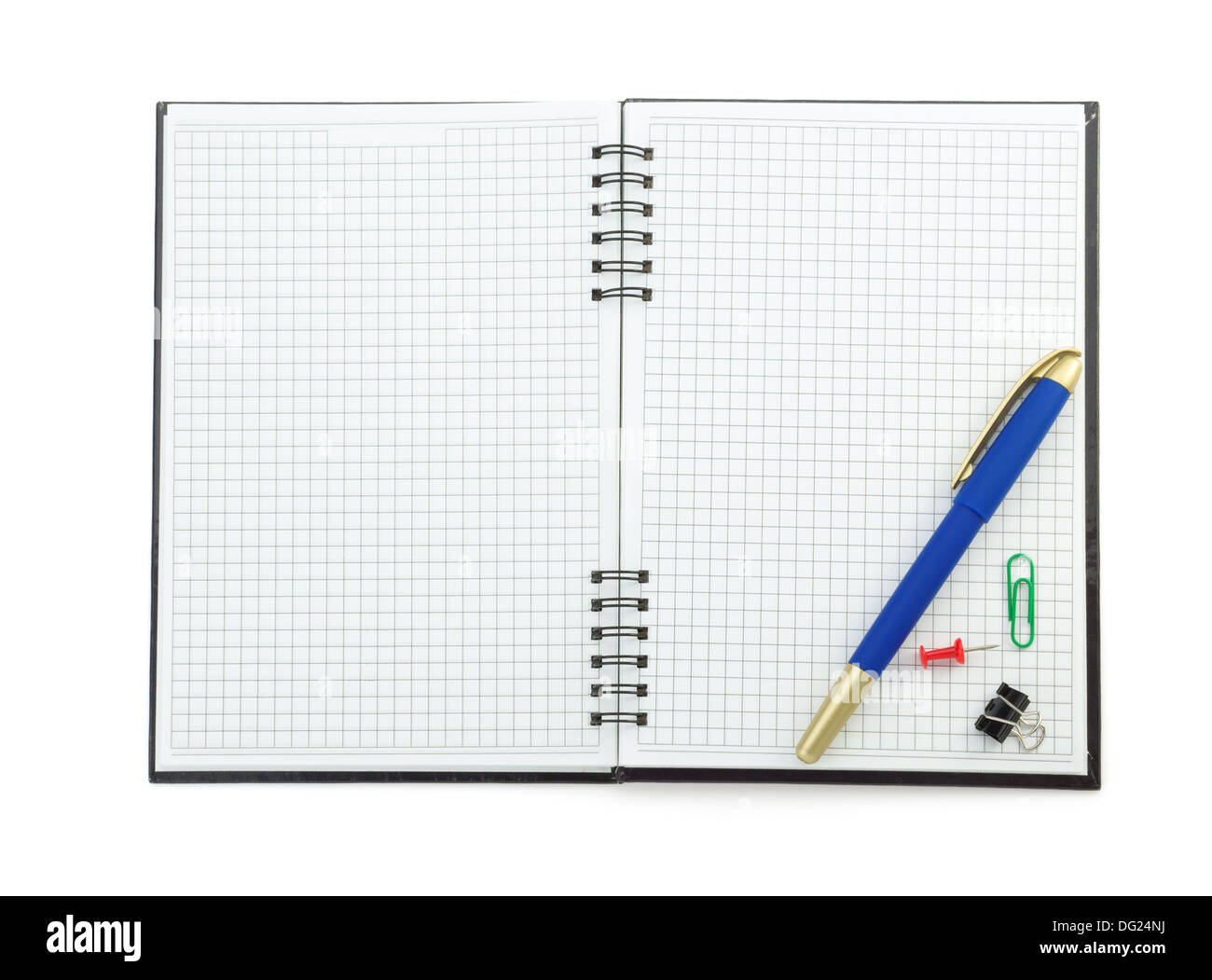 school supplies on checked notebook isolated at white background Stock ...