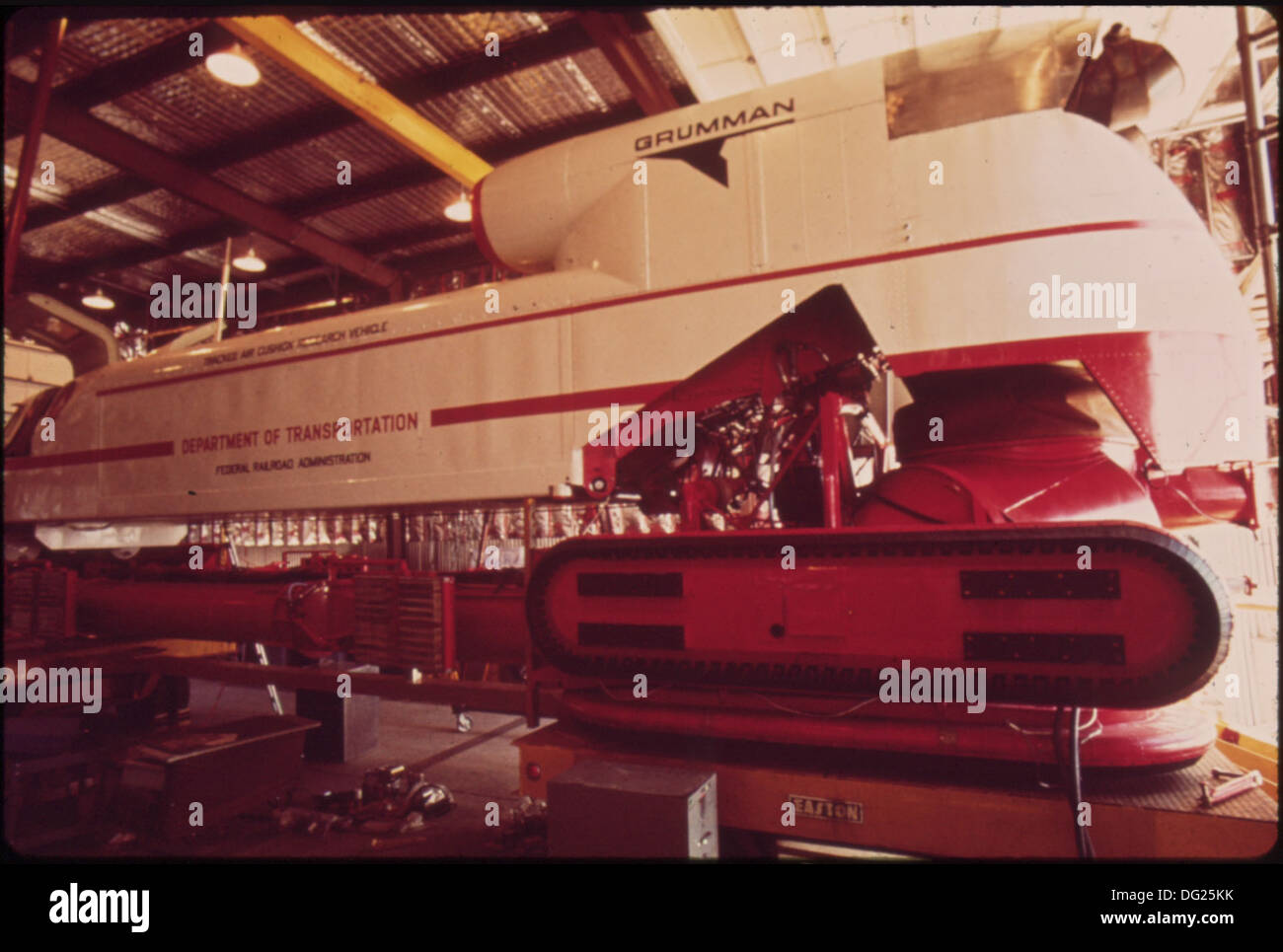 A tracked air cushion research vehicle is seen inside a test area ...