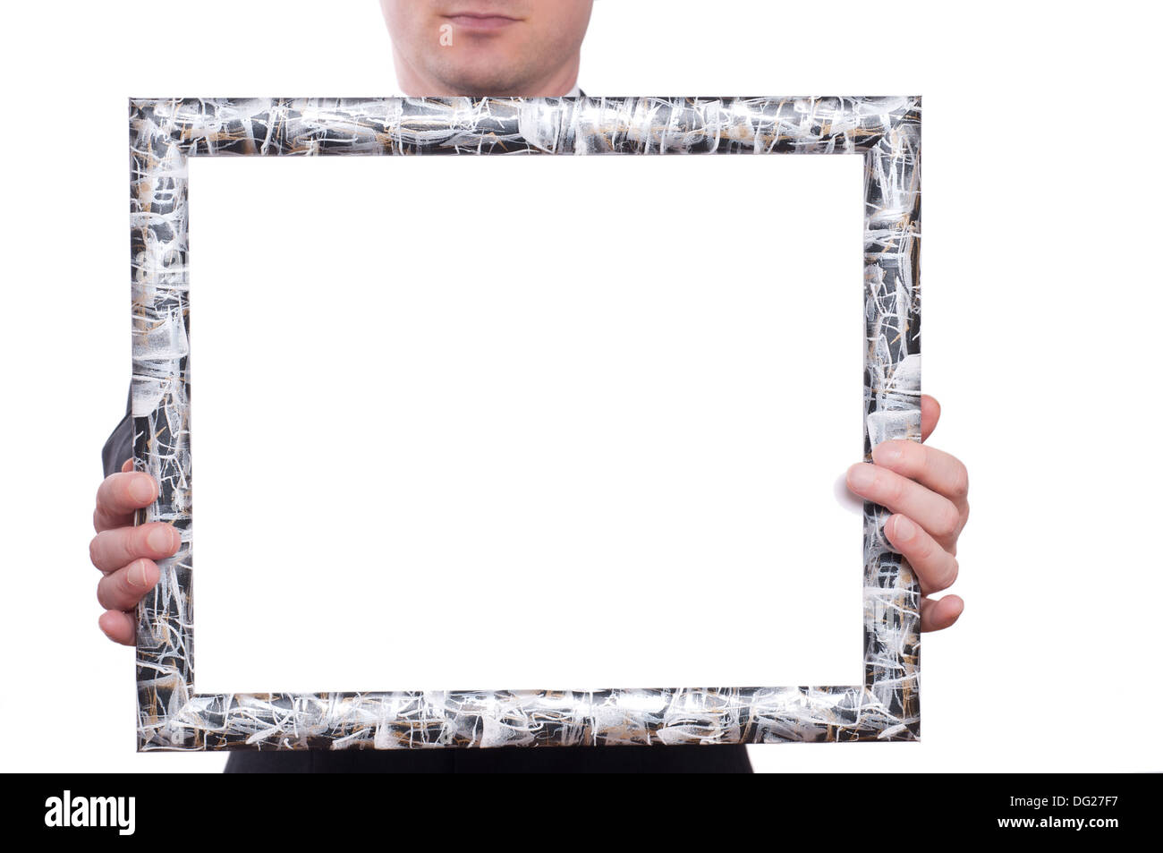 A frame is holding from two hands of a man Stock Photo - Alamy