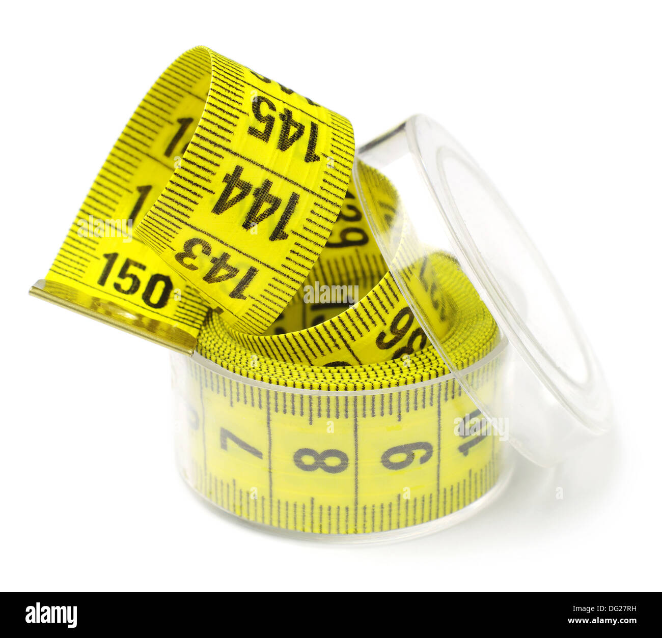 Measuring tape in a box on white Stock Photo - Alamy