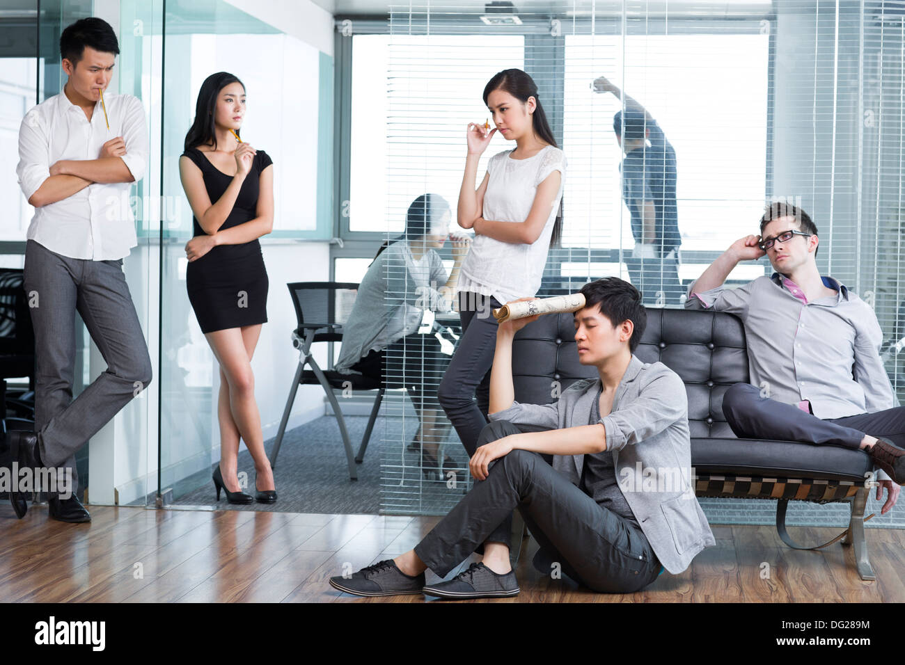 Office workers in deep thought Stock Photo - Alamy