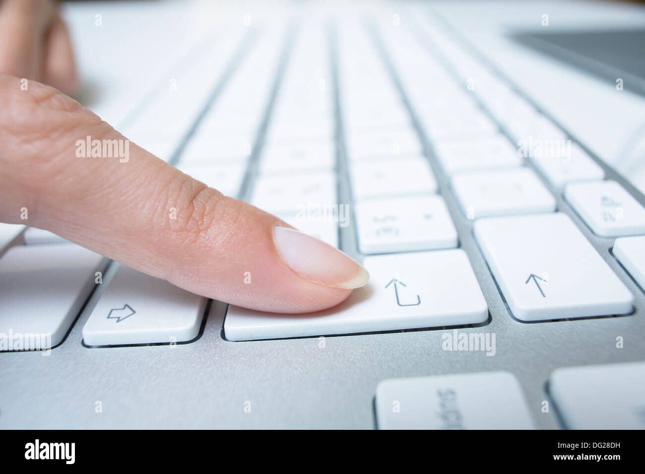 woman laptop finger indoor desk Stock Photo - Alamy