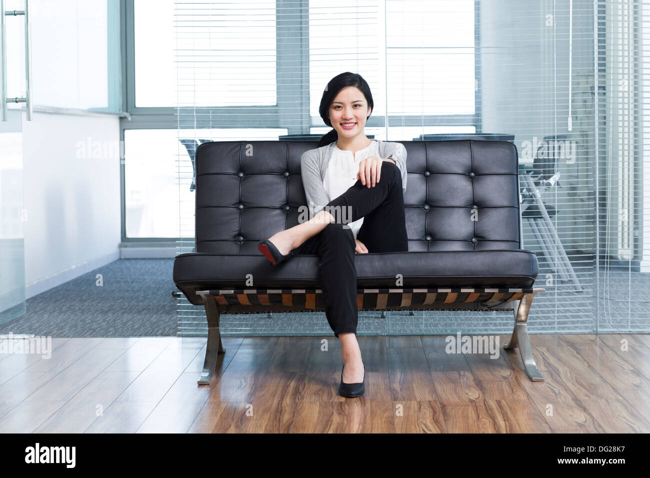 Cool female office worker Stock Photo - Alamy