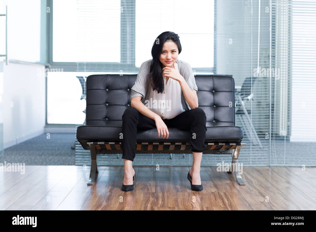 Cool female office worker Stock Photo - Alamy