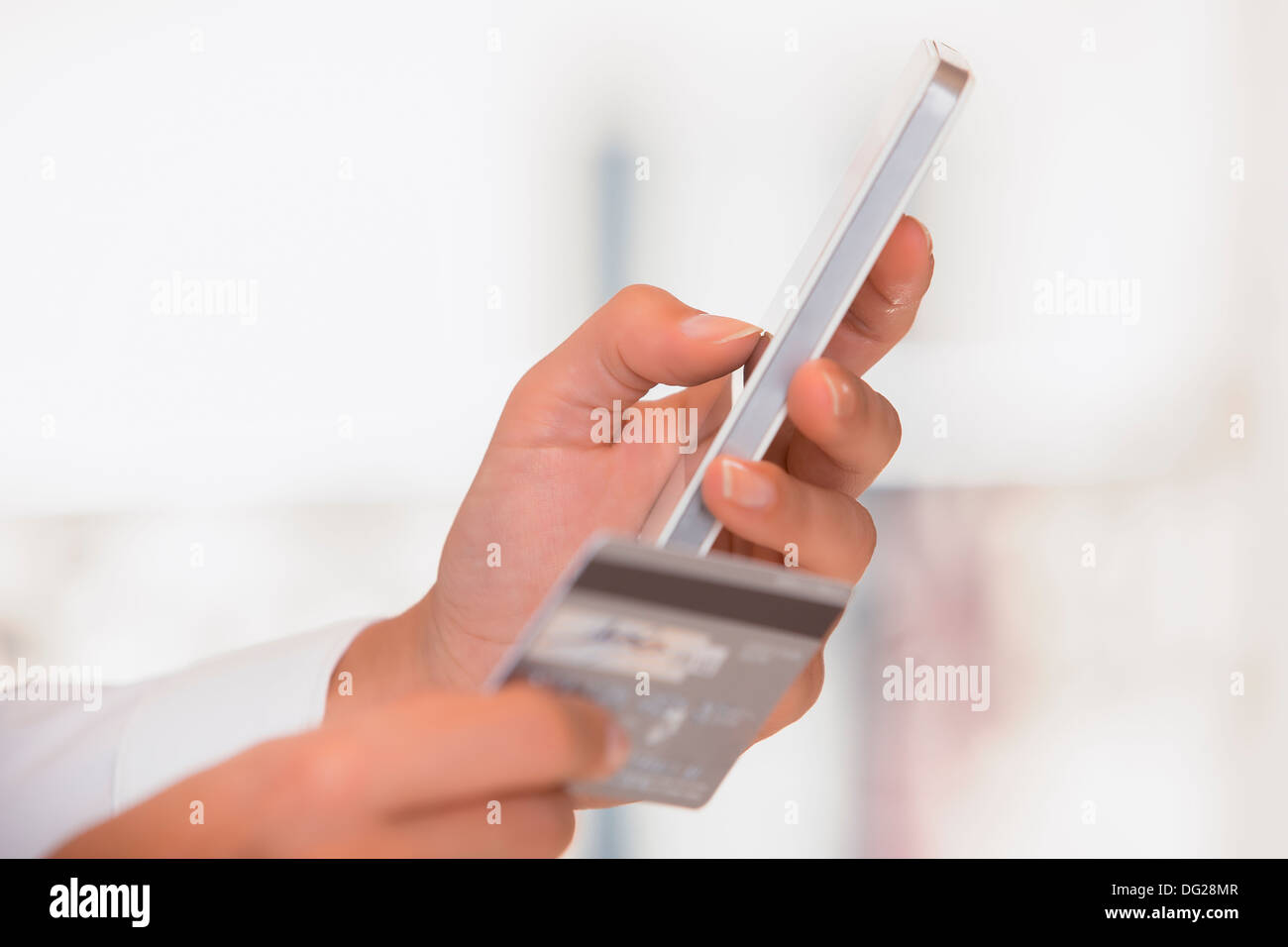 Female mobile phone finger indoor web Stock Photo - Alamy