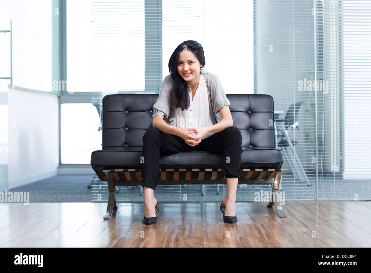 Cool female office worker Stock Photo - Alamy