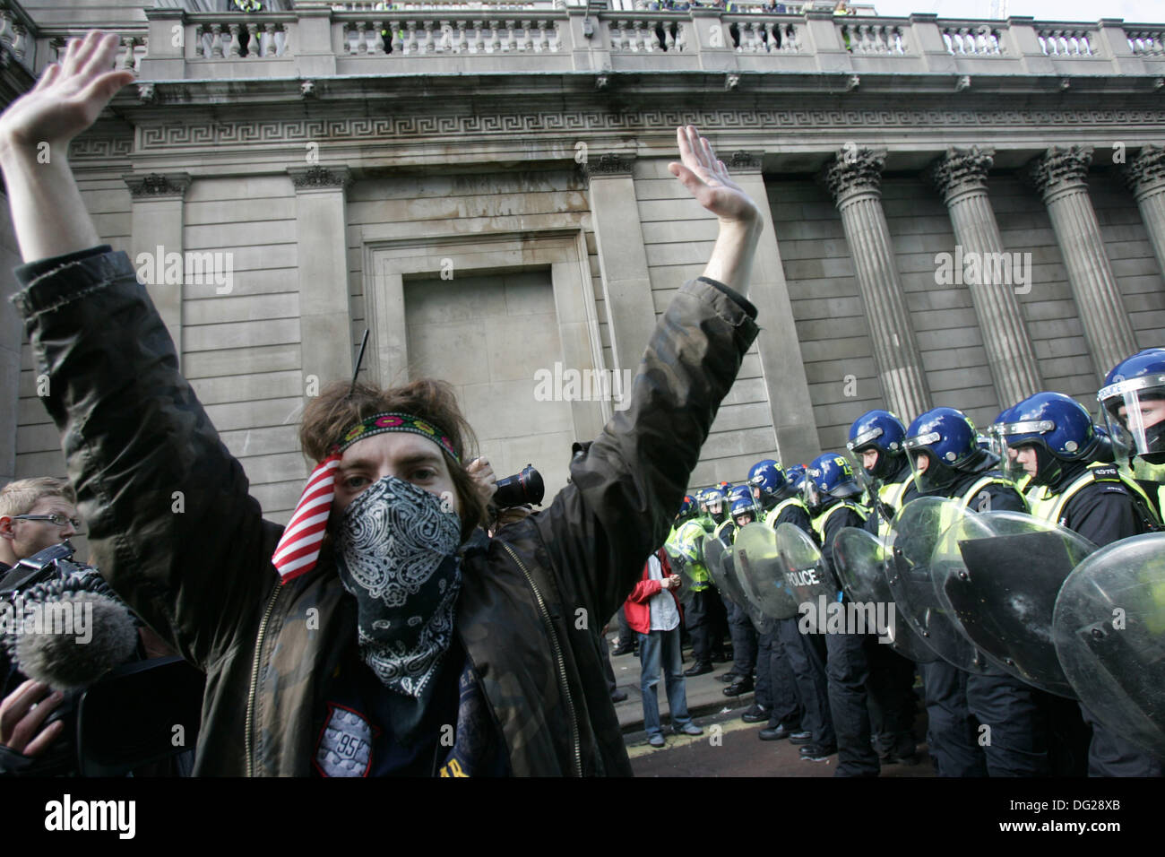Riot police and protesters near the Bank of England in central London ...