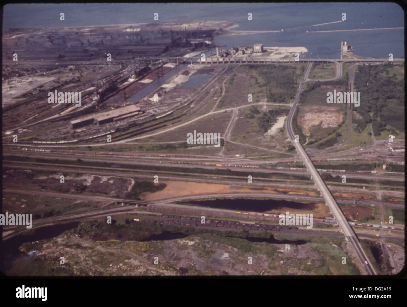 The polluted Buffalo River is shown flowing into Lake Erie. This ...