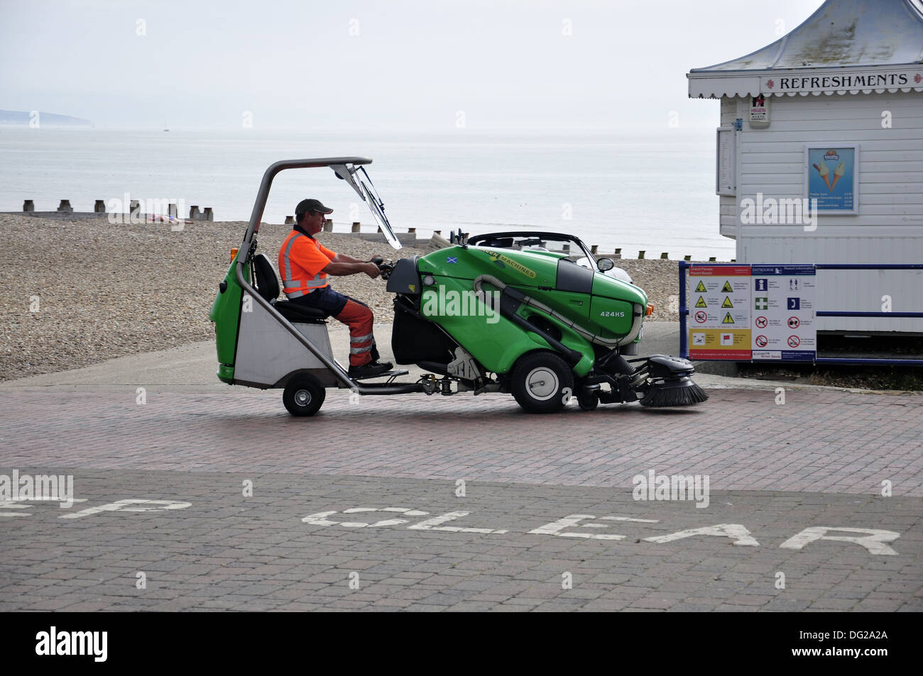 Industrial motorised street sweeper vacuum on Eastbourne front Stock ...