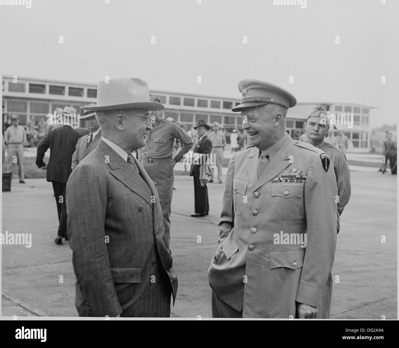 A photograph of President Harry S. Truman laughing and engaging in ...