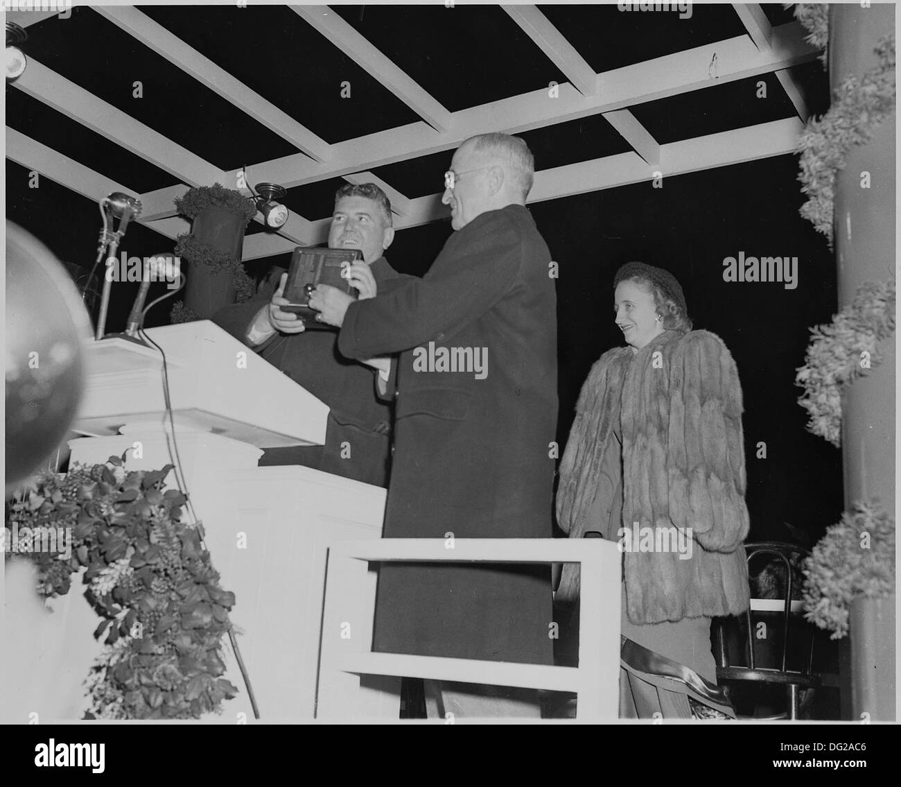 President Harry S. Truman lights the Christmas tree outside the White ...