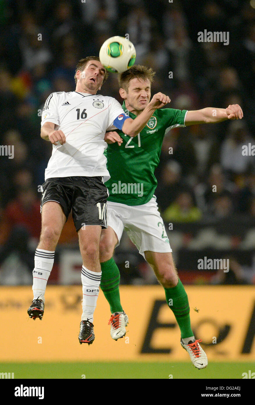 Cologne, Germany. 11th Oct, 2013. Germany's Philipp Lahm (L) and ...