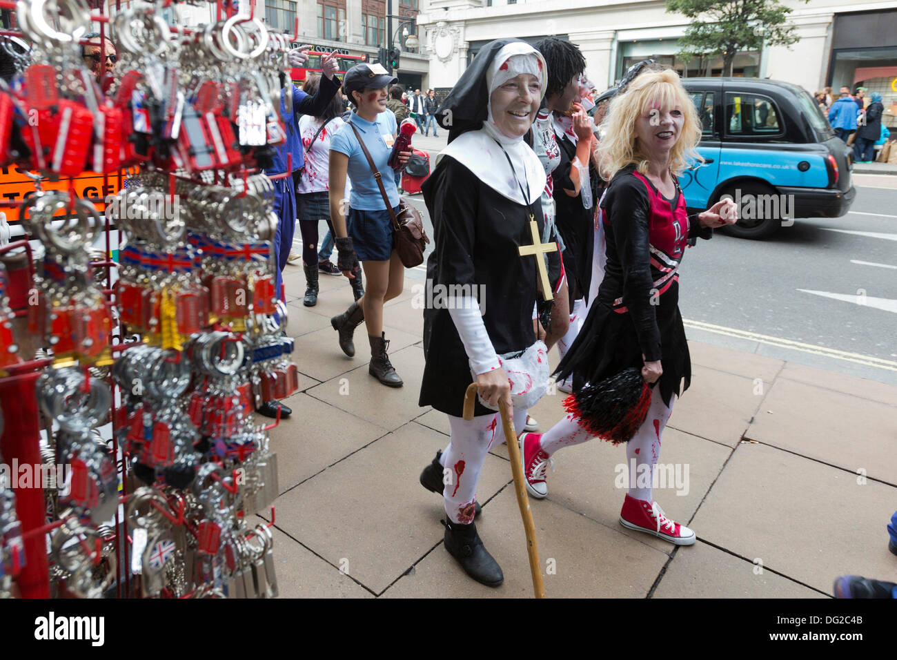 London, UK. 12 October 2013. Zombies in Oxford Street. World Zombie Day ...