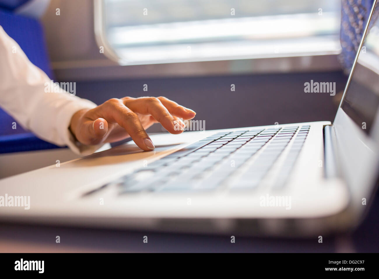 Female finger computer seating wagon Stock Photo - Alamy