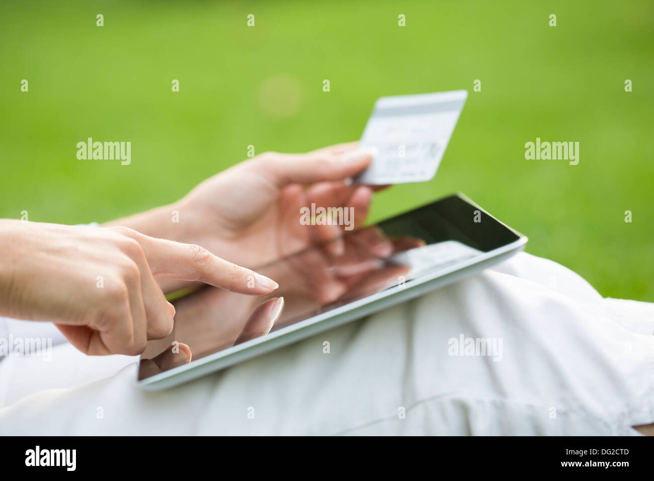 Female outdoor computer finger web plastic card Stock Photo - Alamy