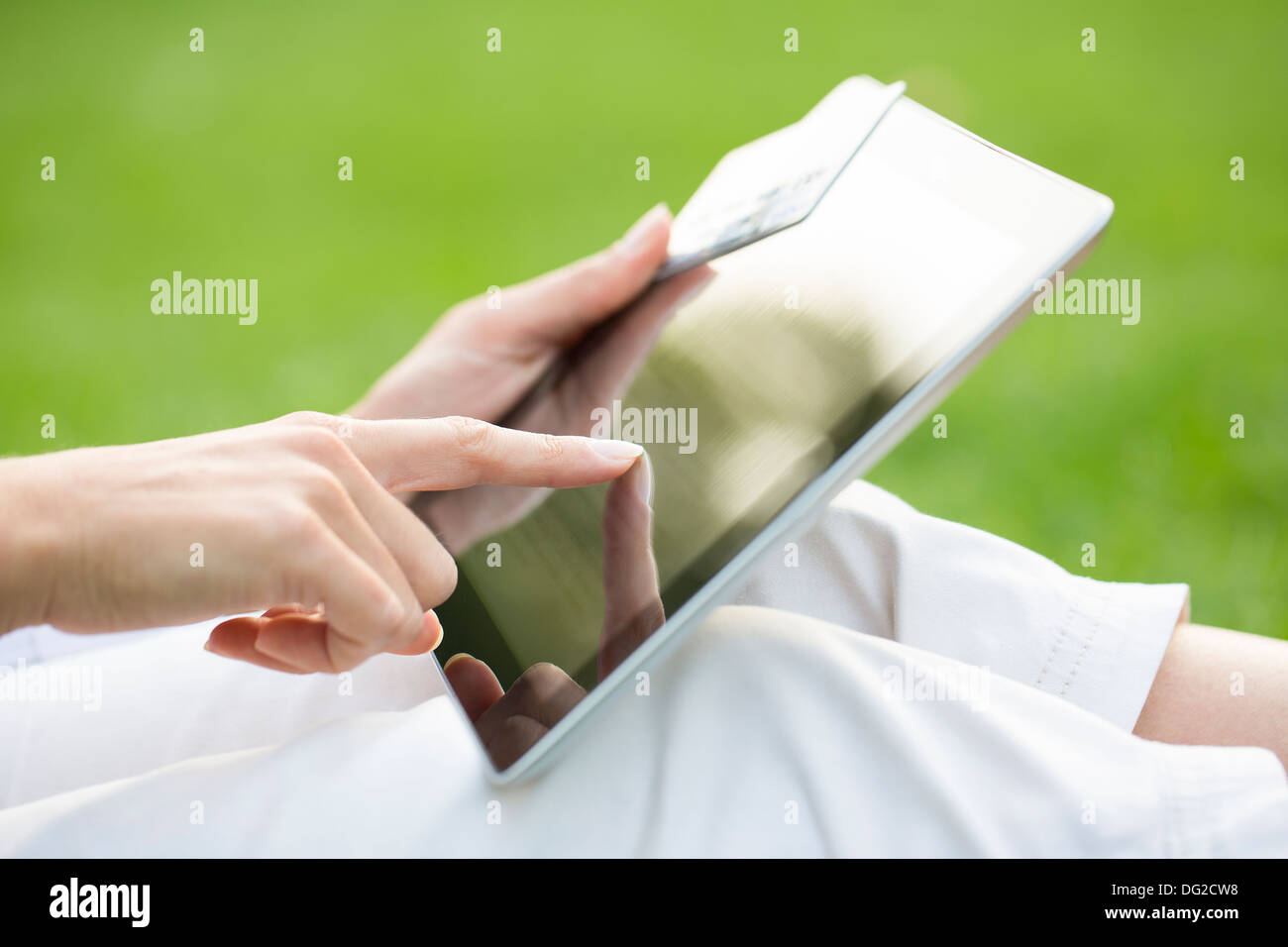 Female outdoor computer finger web plastic card Stock Photo - Alamy