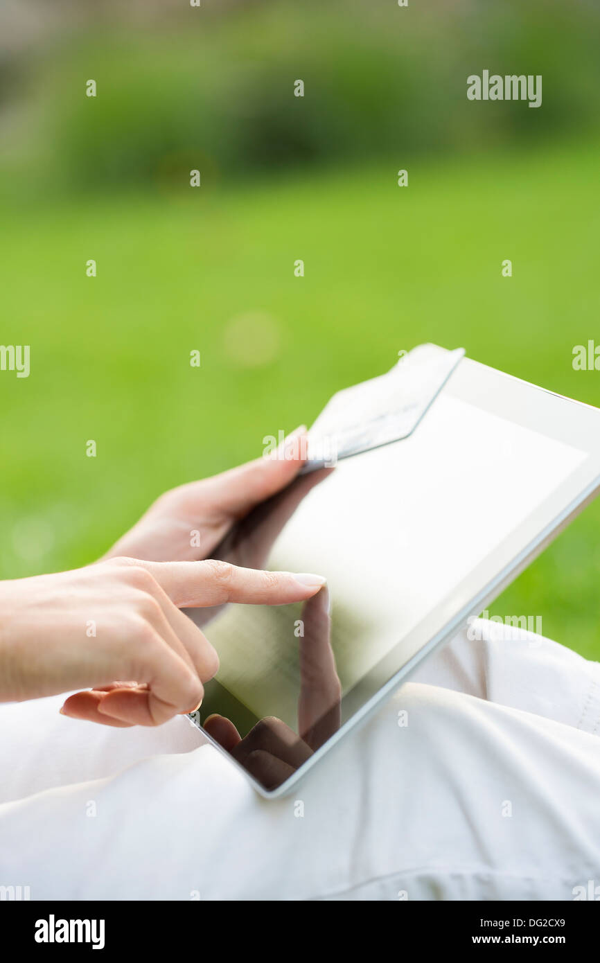 Female outdoor computer finger web plastic card Stock Photo - Alamy