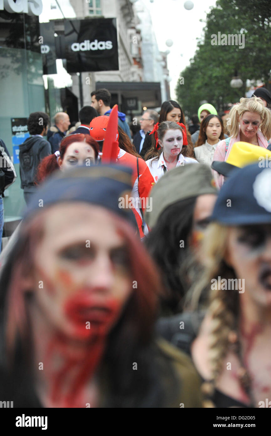 Oxford Street, London, UK. 12th October 2013. Zombies walk through ...